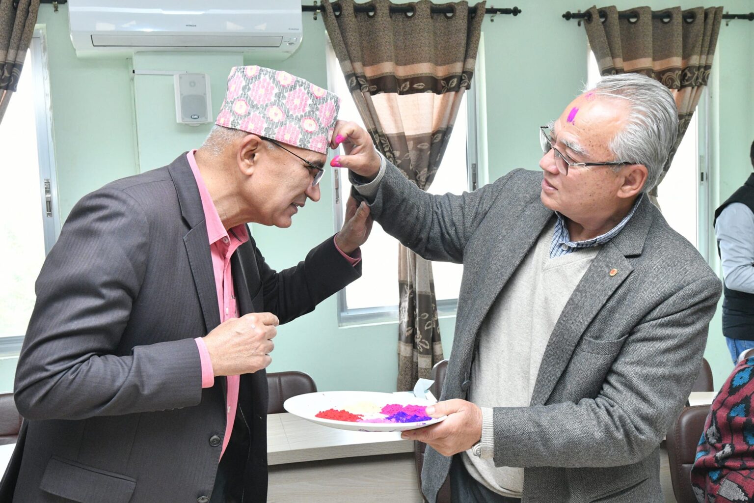 In Pictures: UML leaders celebrated Holi with fanfare - Click Nepal